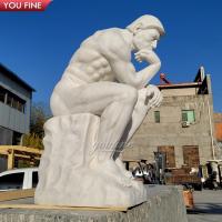 China Custom Outdoor Lawn Marble Sitting Man Statue for sale