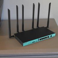 China Dual Band Gigabit Openwrt EM12-G CAT12 5G Wireless Router 20W for sale