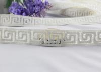 China Irregular Graph 100% Cotton Lace Fabric Trim For Garment By The Yard Water Soluble for sale