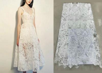 China Shiny Sequin Embroidered Floral Beaded Bridal Lace Fabric for sale