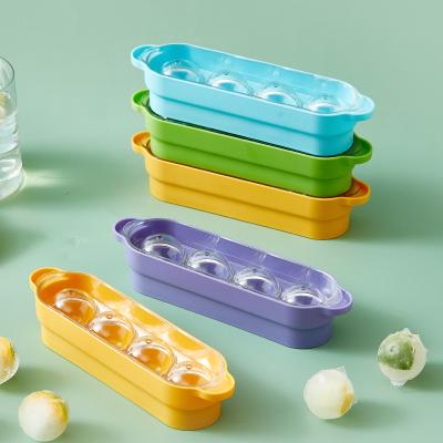 China 4 Grid Creative Plastic Silicone Ice Cube Moulds Reusable Round Ice Ball Tray for sale