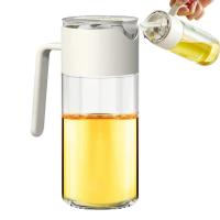 China Gravity Automatically Open Close Oil Dispenser Bottle Leakproof 550ml With Pourer for sale