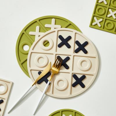 China Square X O Two Color 5.5mm  Non Slip Silicone Cup Mat For Tabletop Protection for sale