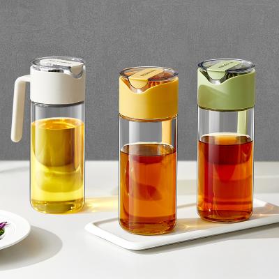 China Auto Flip Cooking Oil Bottles Leak Proof Oil Dispenser Bottle With Automatic Stopper Cap Non Slip Handle For Kitchen Cooking for sale