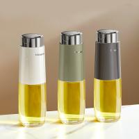 China 280ml 500ml Kitchen Glass Auto Flip Oil Dispenser Cooking Leakproof No Drip Stainless Steel Cap Oil Container Soy Sauce Bottle for sale