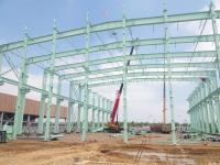 China Prefabricated Steel Frame Warehouse Building 50 Year Lifespan Wind Grade 12 for sale
