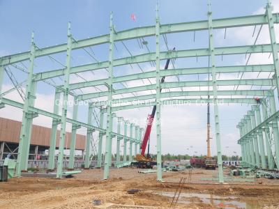 China Prefabricated Steel Frame Warehouse Building 50 Year Lifespan Wind Grade 12 for sale