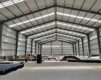 China Steel Structure Warehouse featuring strong foundations and reinforced steel structures for enhanced safety and stability for sale