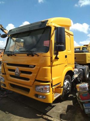 China Yellow Used Tractor Trucks HOWO 6x4 Tractor 375 Heavy Work Transportation for sale