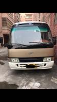 China 7 meter Long White and Brown  color Used TOYOTA coaster bus  Tyre 7.50R16 6 Cylinder for sale