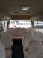 China Used Toyota Coaster Bus Brown Color Popular  Cheap Sale Gas/Petrol/Diesel Engine 30 Seater LHD Steering Position for sale