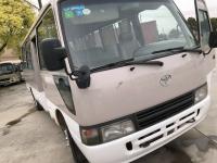 China Grey Color Used Toyota Coaster Bus 1HZ  Manual Transmission   Second Hand Diesel Bus 23-30 Passenger for sale
