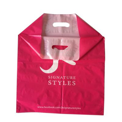 China full colors printed patch reinforced die cut handle plastic merchandise gift carry out bags for sale