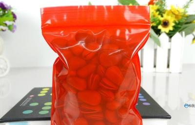 China red color LDPE food grade plastic ziplock waterproof dustproof reclosable grip seal bags for sale