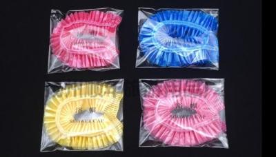 China coloured clear pink blue yellow poly disposable bathing shower beauty salon spa hairdressing cover elastic caps for sale