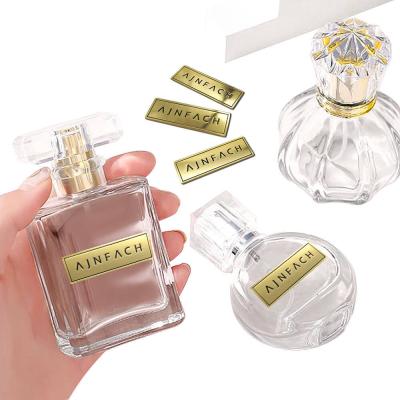 China Self Adhesive 3D Embossed Aluminum Labels Gold 1-2mm Thick for Perfume Bottles for sale