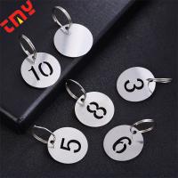 China Custom Stainless Steel Number Keychain Tag 23mm 1-100 Hollow ID Key Chain Label for sale
