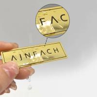 China Custom Aluminum Labels 3D Embossed Gold Finish Self Adhesive Metal Sticker 59x15mm for Perfume Bottles for sale
