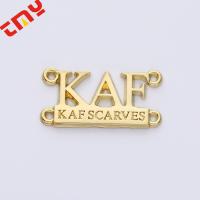 China Custom Engraved Metal Clothes Tags 45x13mm Personalized Logo Label Accessories for Apparel Branding for sale