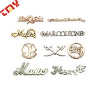 China Custom Engraved Metal Clothes Tags 45x13mm Personalized Logo Label Accessories for Apparel Branding for sale