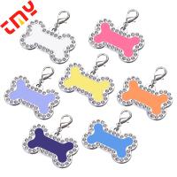 China Crystal Dog Tag Bone Shape Metal ID Tag with Rhinestone 50x30mm Customizable for sale