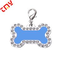 China Crystal Dog Tag Bone Shape Metal ID Tag with Rhinestone 50x30mm Customizable for sale