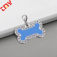 China Crystal Dog Tag Bone Shape Metal ID Tag with Rhinestone 50x30mm Customizable for sale
