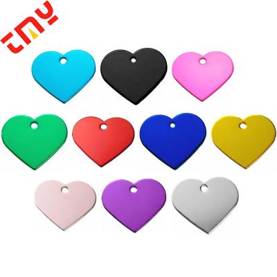 China Aluminum Heart Shape Pet ID Tags 30x27mm Custom Logo Engraving Lightweight Metal Crafts for Cats Dogs for sale