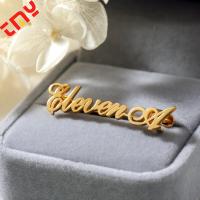 China Custom 3D Embossed Gold Letter Lapel Pin 60x10mm Zinc Alloy Hollow Brooch for Suits for sale