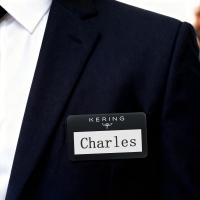 China Custom Full Color Digital Printed Plastic Name Tag 75x35mm with Magnetic Back for Staff for sale