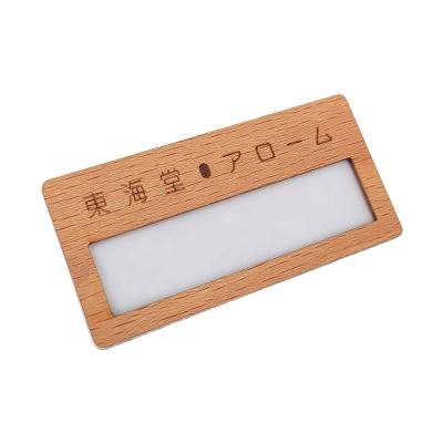 China Custom Wooden Window Name Badge with Bamboo Decoration 75x35mm Folk Art Style for sale
