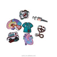 China Custom 3D Embossed Doctor Medical Brooches Enamel Caduceus Stethoscope Heart Pin 1.5mm Thick for sale
