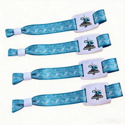 China Custom RFID NFC Waterproof Wristband TAG 215 Programmable 13.56MHz Woven Fabric Mini Polycarbonate Tag Membership Card Hotel for sale