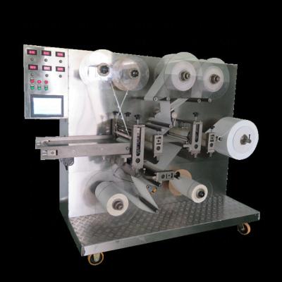 China Motor-Driven KR-QFT-A Island Wound Plaster Machine for 100x100mm Wound Dressing Patch for sale