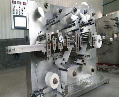 China Electric Driven Wound Plaster and Adhesive Bandage Machine for 10x10cm Size Packaging for sale