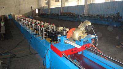 China Automatically Punching PU Shutter Door Roll Forming Machine Flat Injection 24 * 0.6 * 0.9m for sale