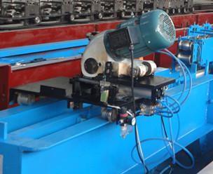 China Gearbox Transmission PU Foam Shutter Door Roll Forming Machine 11kw 380V with Flying Saw Cutting for sale