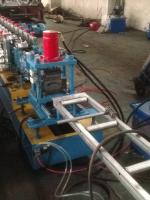 China Hydraulic Quick Punching Metal Shutter Door Roll Forming Machine Single Profile Holes for sale