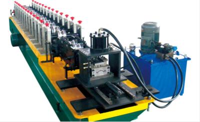 China Chain Transmission Iron Rolling Shutter Door Roll Forming Machine 12 Stations for sale