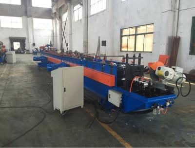 China 13 Teeth High Speed Shutter Door Roll Forming Machine with PLC Control - 12-15m/min Speed, 0.7-1.2mm Steel Capacity for sale