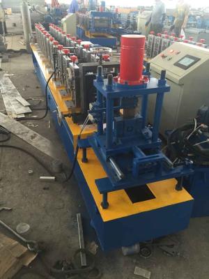 China Hydraulic Cutting Chain Drive Galvanized Steel Door Rail Roll Forming Machine 7.5kW for sale