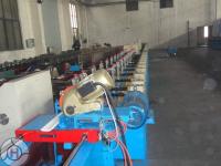 China Color Coated Galvanized Steel Shutter Door Roll Forming Machine with 46 Roller Stations and 11 Kw Motor Power for sale