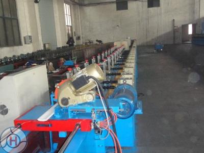 China Color Coated Galvanized Steel Shutter Door Roll Forming Machine with 46 Roller Stations and 11 Kw Motor Power for sale