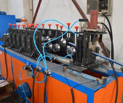 China High Speed  Wall Angle Steel Angle Profile Bar Making Machine Follow Track Cutting System for sale