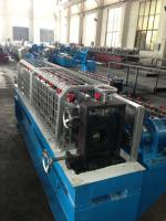 China Galvanized Steel Roof Batten Cold Roll Forming Machine 0.8-1.2mm Hydraulic Cutting 10-15m/min for sale