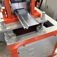 China Punching Holes Metal Shutter Door Roll Forming Machine 7.5KW 16-18 Stations for sale