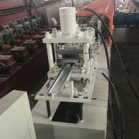 China Punching Holes Metal Shutter Door Roll Forming Machine 7.5KW 16-18 Stations for sale