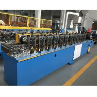 China Punching Holes Metal Shutter Door Roll Forming Machine 7.5KW 16-18 Stations for sale