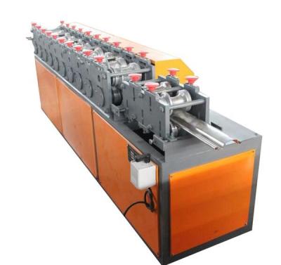 China Fully Automatic 0.7-1.0mm Galvanized Steel Shutter Door Roll Forming Machine with 12 Stations and PLC Control for sale