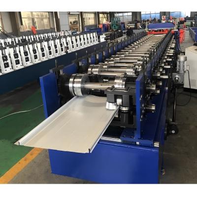 China 300mm Adjustable Roof Panel Roll Forming Machine Bemo Standing Seam With Perforated Holes for sale